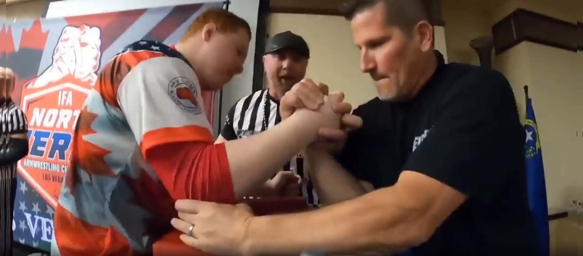 (Video) Arm Wrestler Struggles to Bend Rules Against Much Younger Opponent